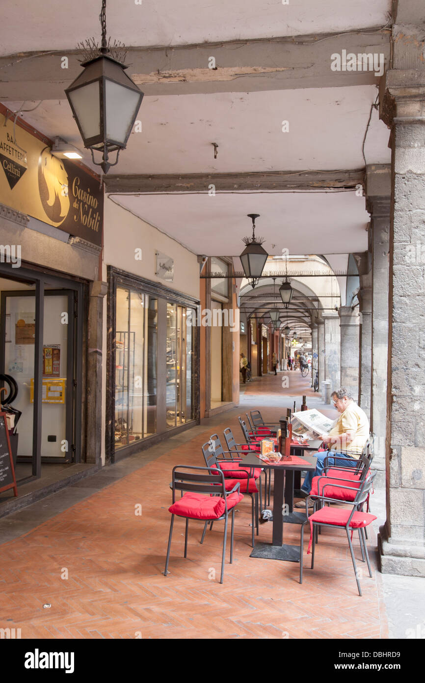 Cafe Tables in Arcade of Borgo Stretto Street, Pisa, Italy Stock Photo ...