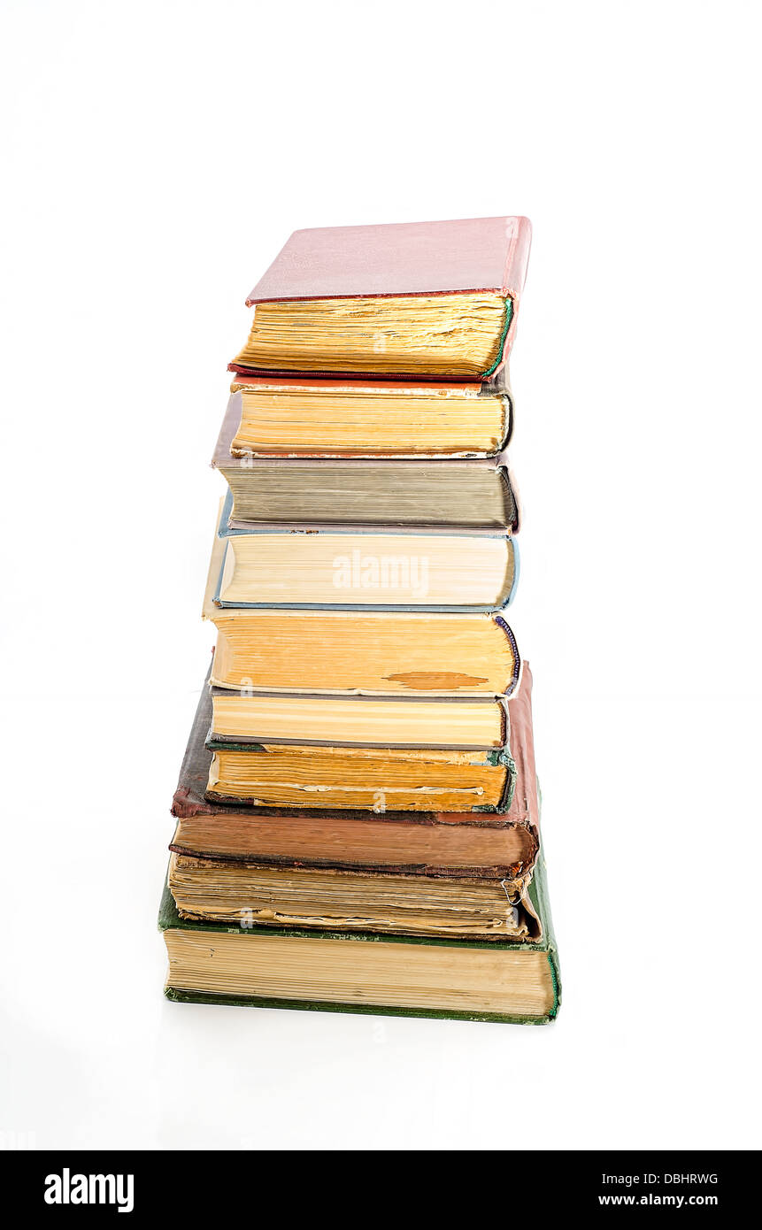 Stack of old books isolated on the light background Stock Photo - Alamy