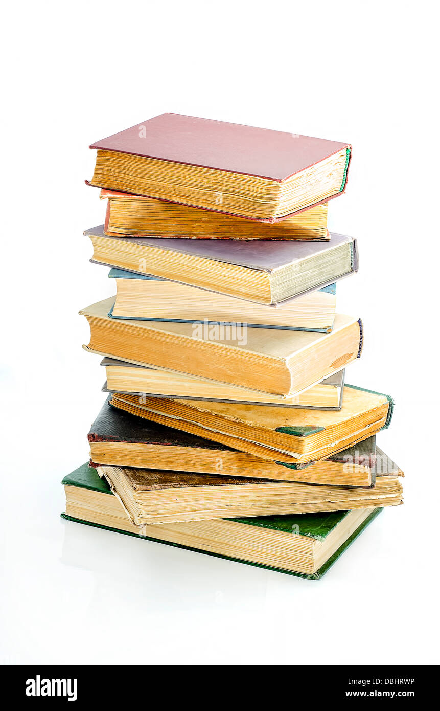 Stack of old books isolated on the light background Stock Photo - Alamy
