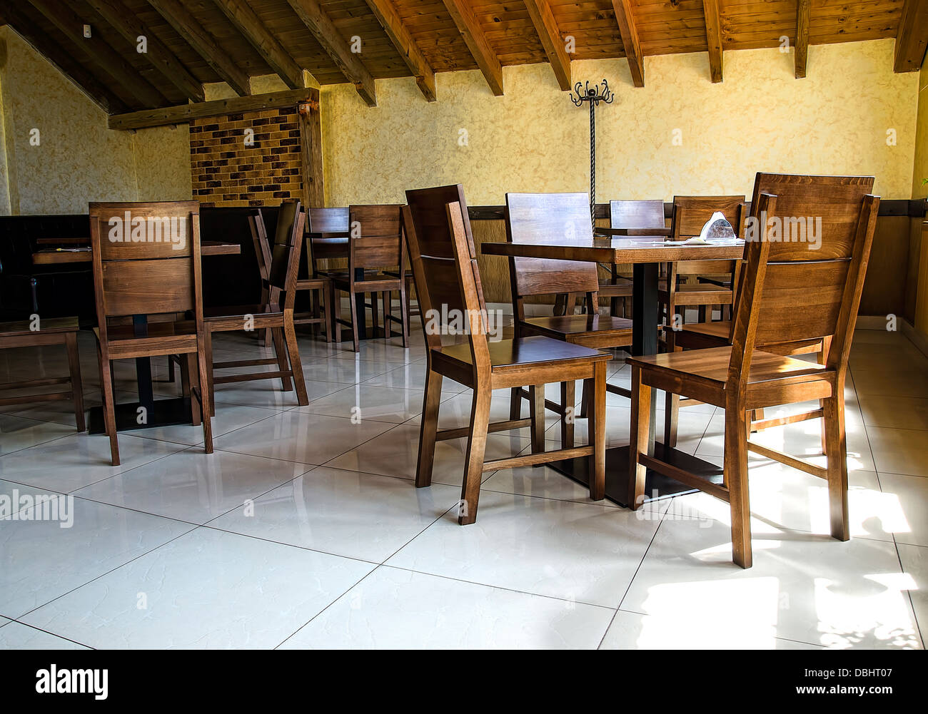 Empty restaurant interior in brown and white tones Stock Photo - Alamy