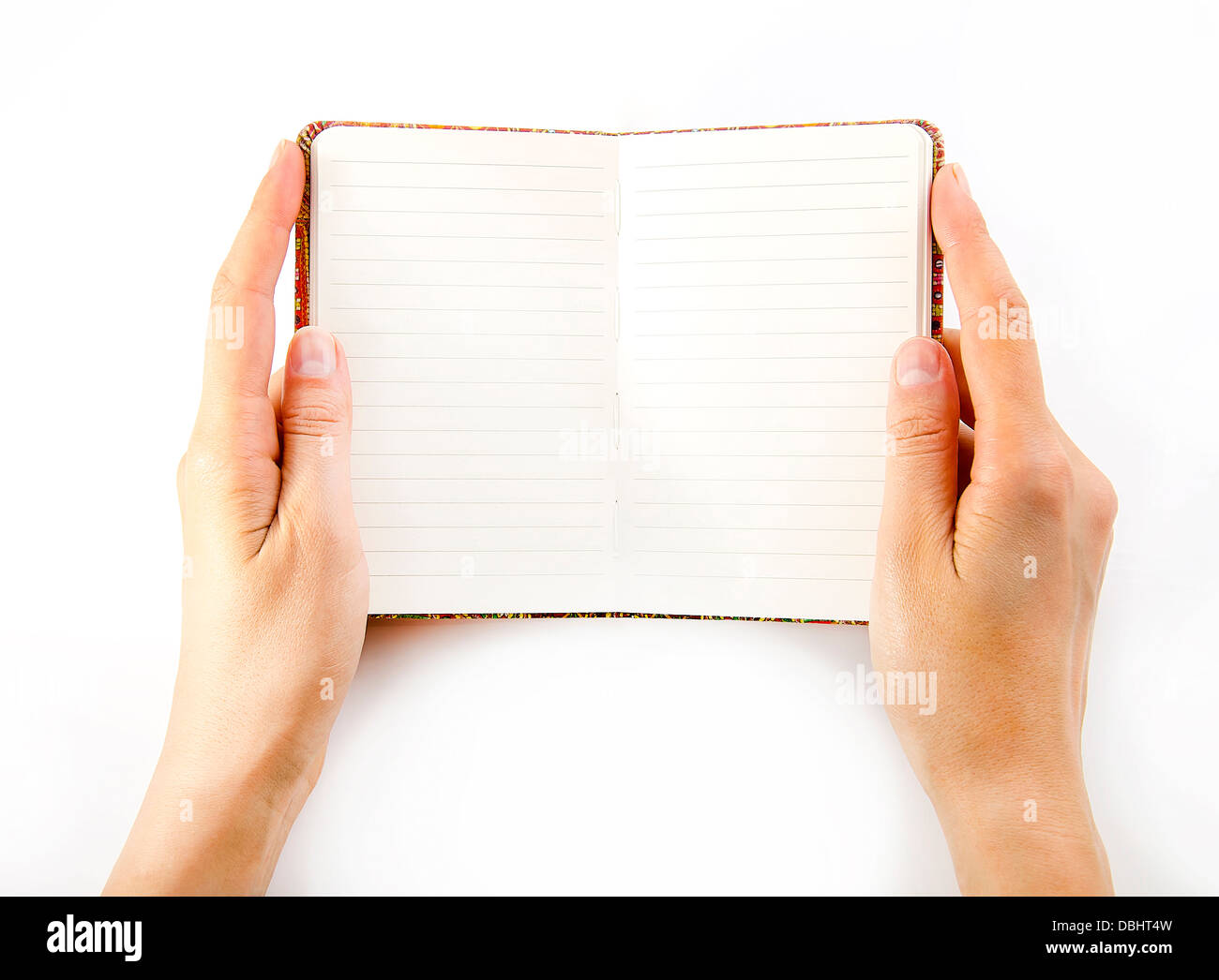 Woman hand carrying an empty book on white background Stock Photo - Alamy