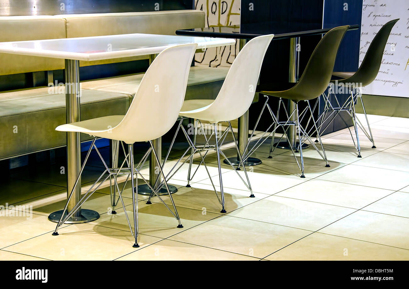 Empty restaurant interior sofas and chairs are trendy Stock Photo - Alamy