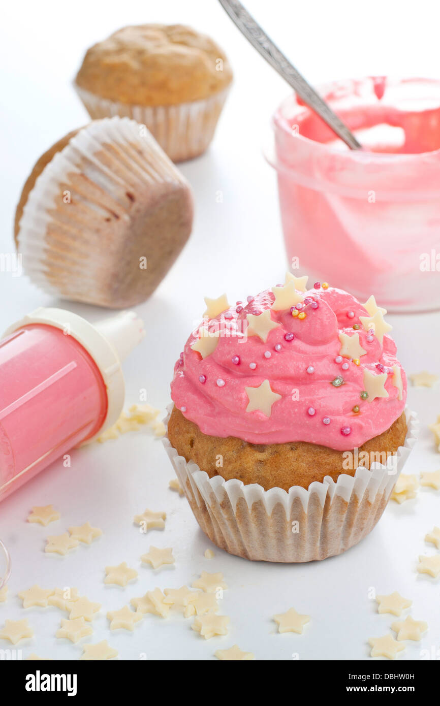 Decorated cupcake with stars and icing Stock Photo - Alamy