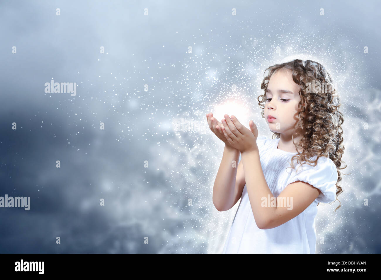 Child with magic light Stock Photo - Alamy