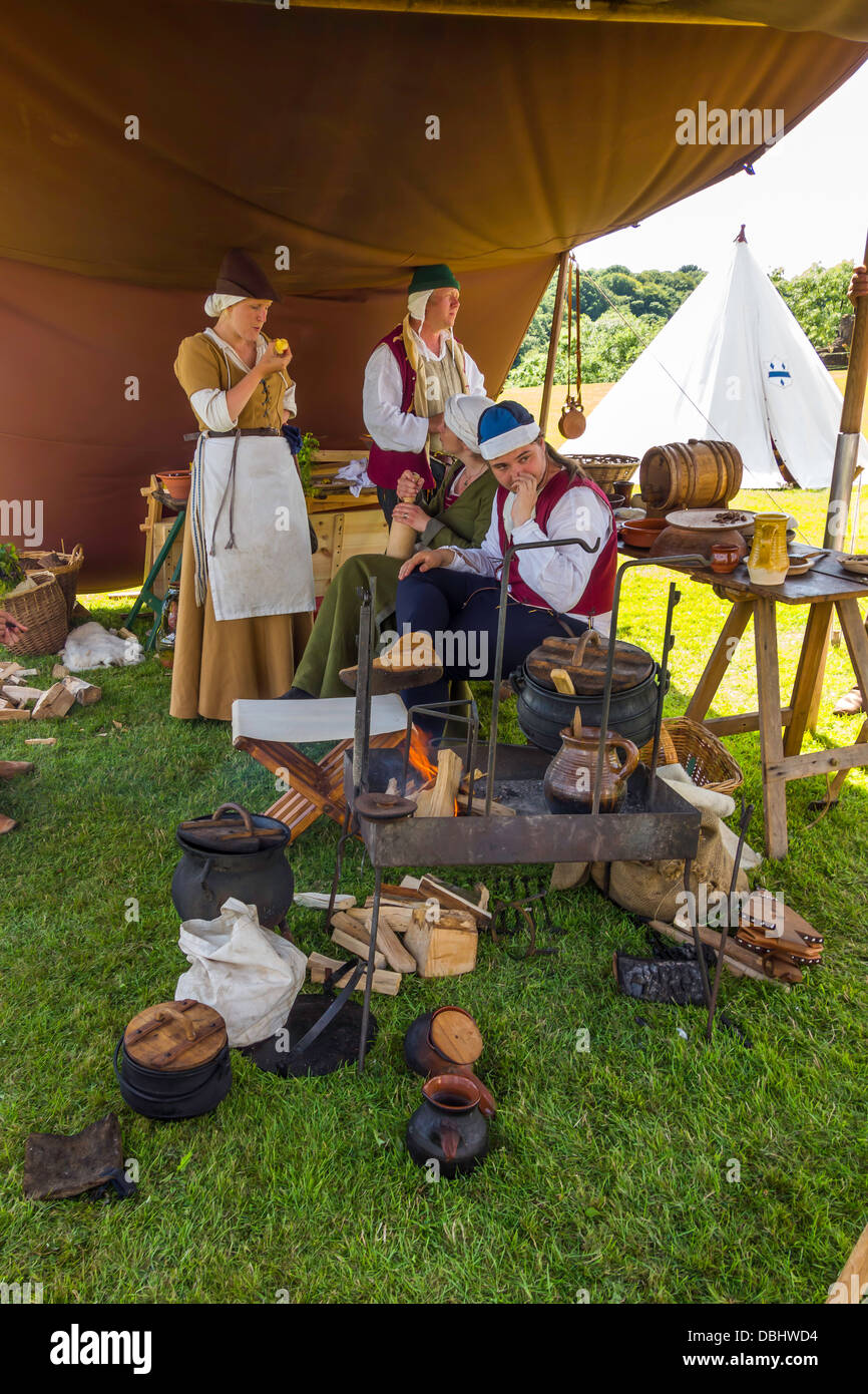 Medieval reenactment cooking kitchen tent with cooks food and utensils ...