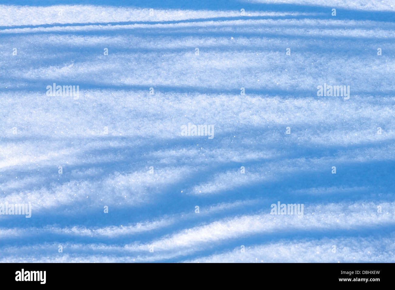 Photo of blue shadows on white snow Stock Photo - Alamy