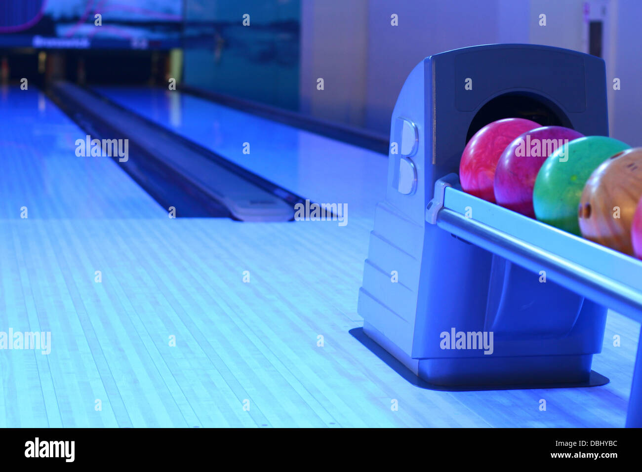 colored bowling bolls in a row Stock Photo - Alamy