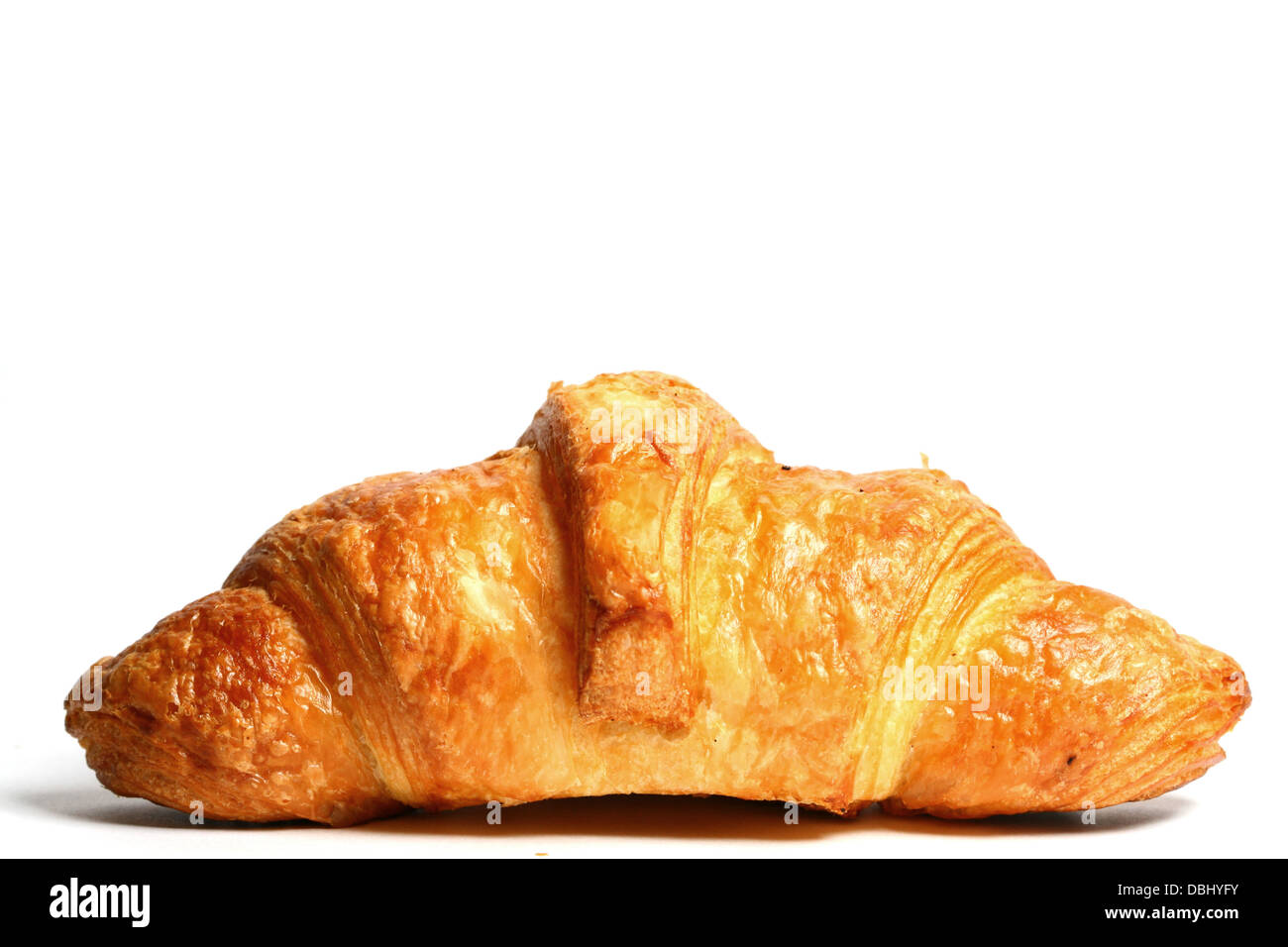 Croissant isolated on white background macro Stock Photo - Alamy