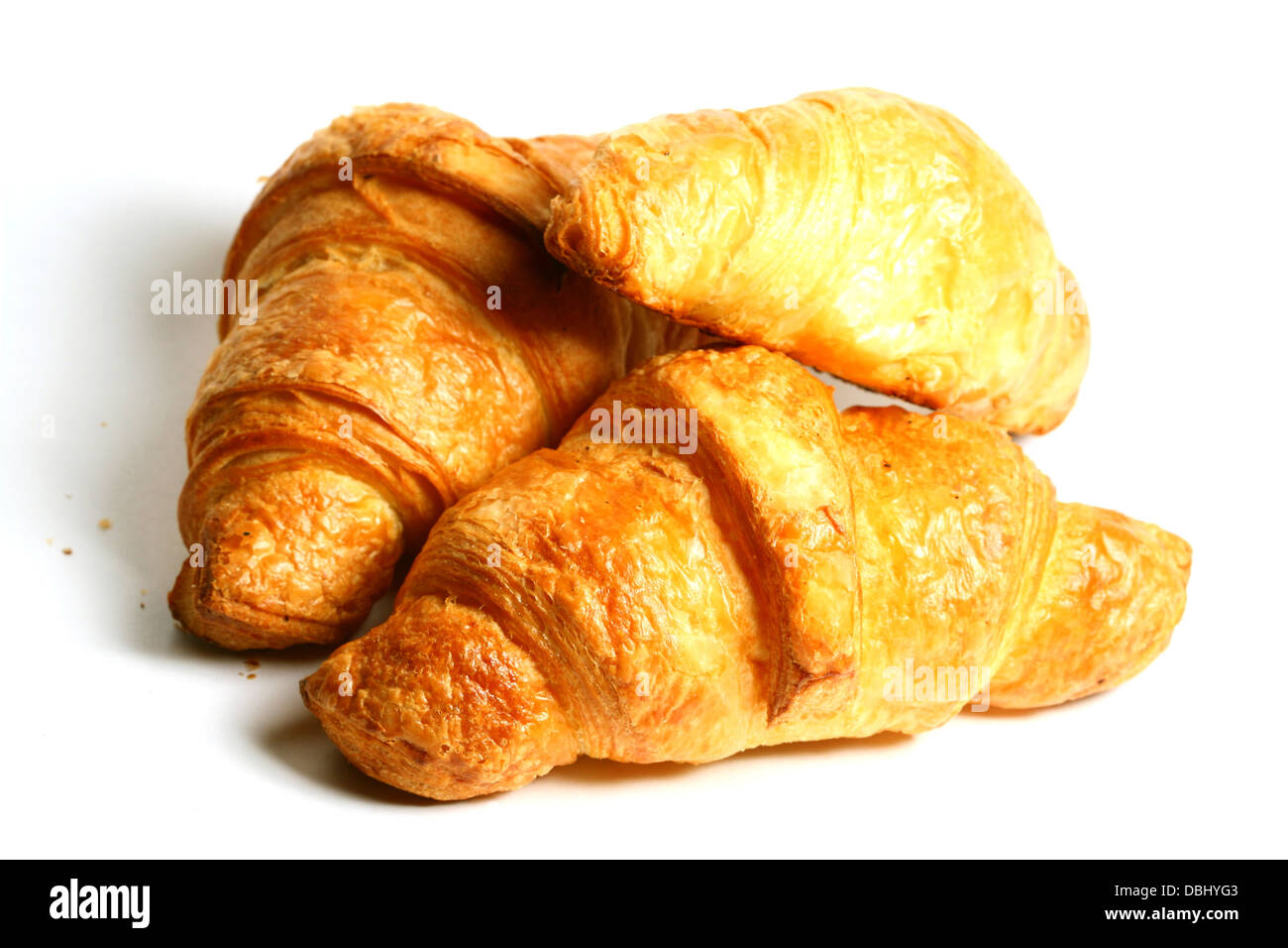 Croissant isolated on white background macro Stock Photo - Alamy