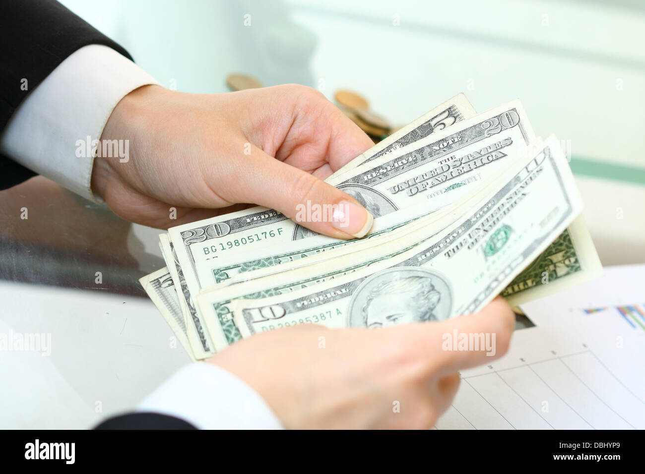 hands counting dollar money on white background Stock Photo - Alamy