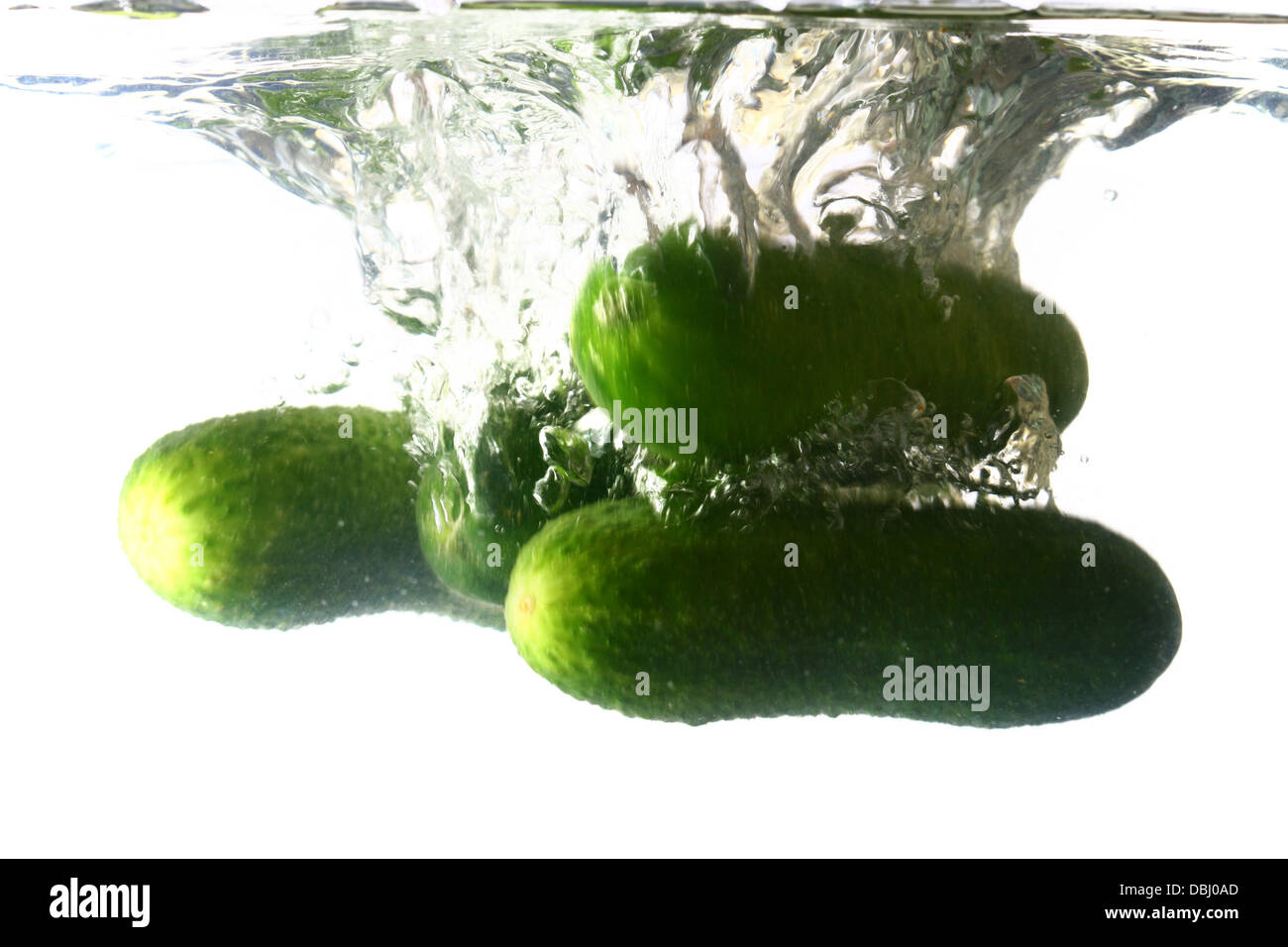 cucumber splash isolated on white background Stock Photo - Alamy