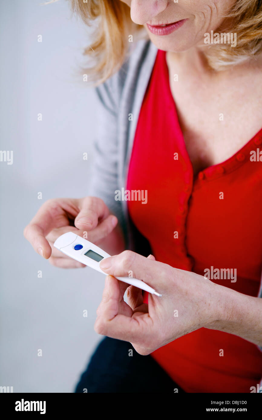 TEMPERATURE ELDERLY PERSON Stock Photo - Alamy