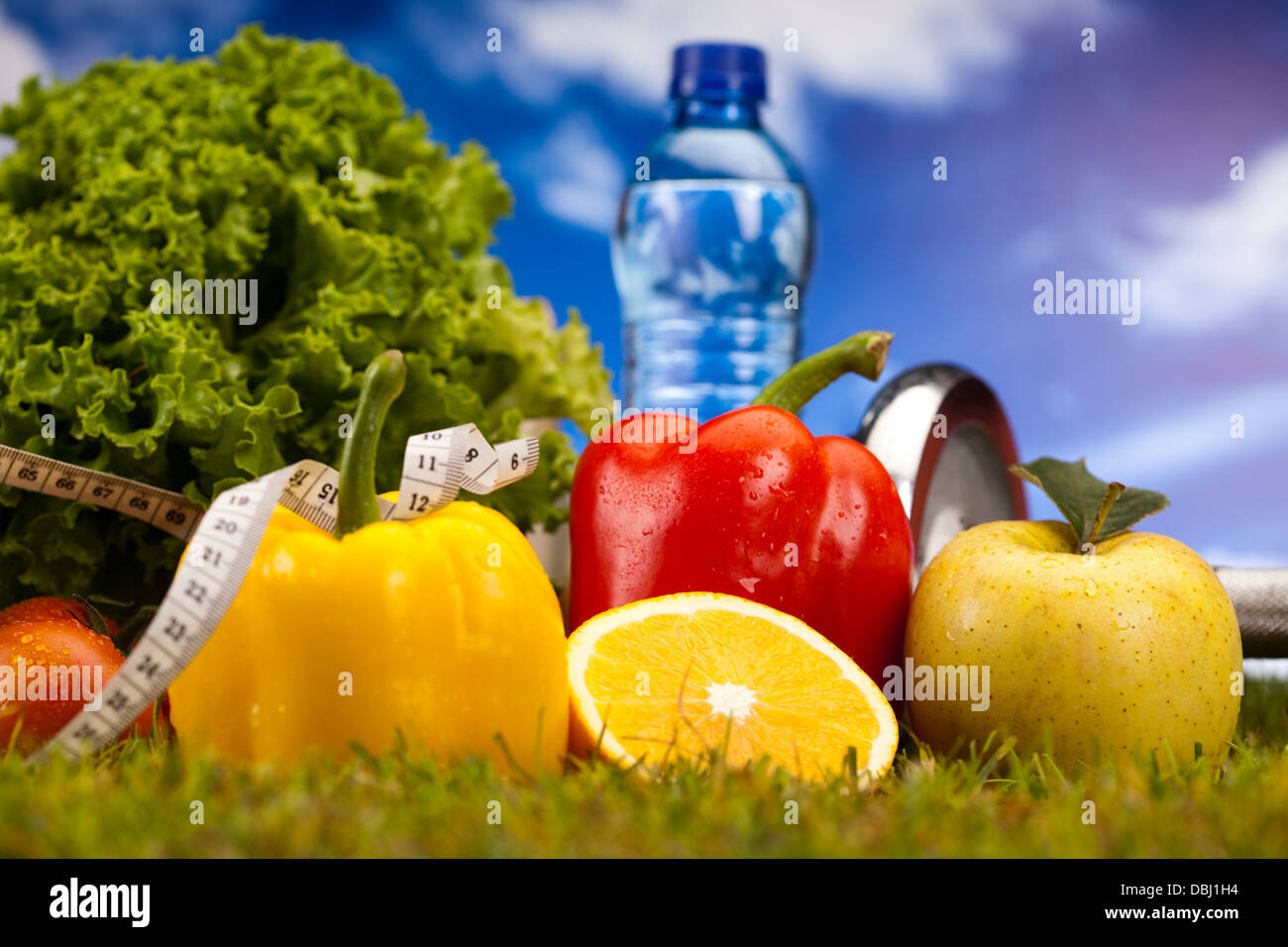 Vegetable and fitness in green grass Stock Photo - Alamy