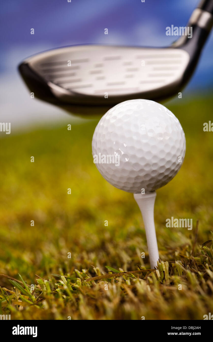 Playing golf, ball on tee Stock Photo - Alamy