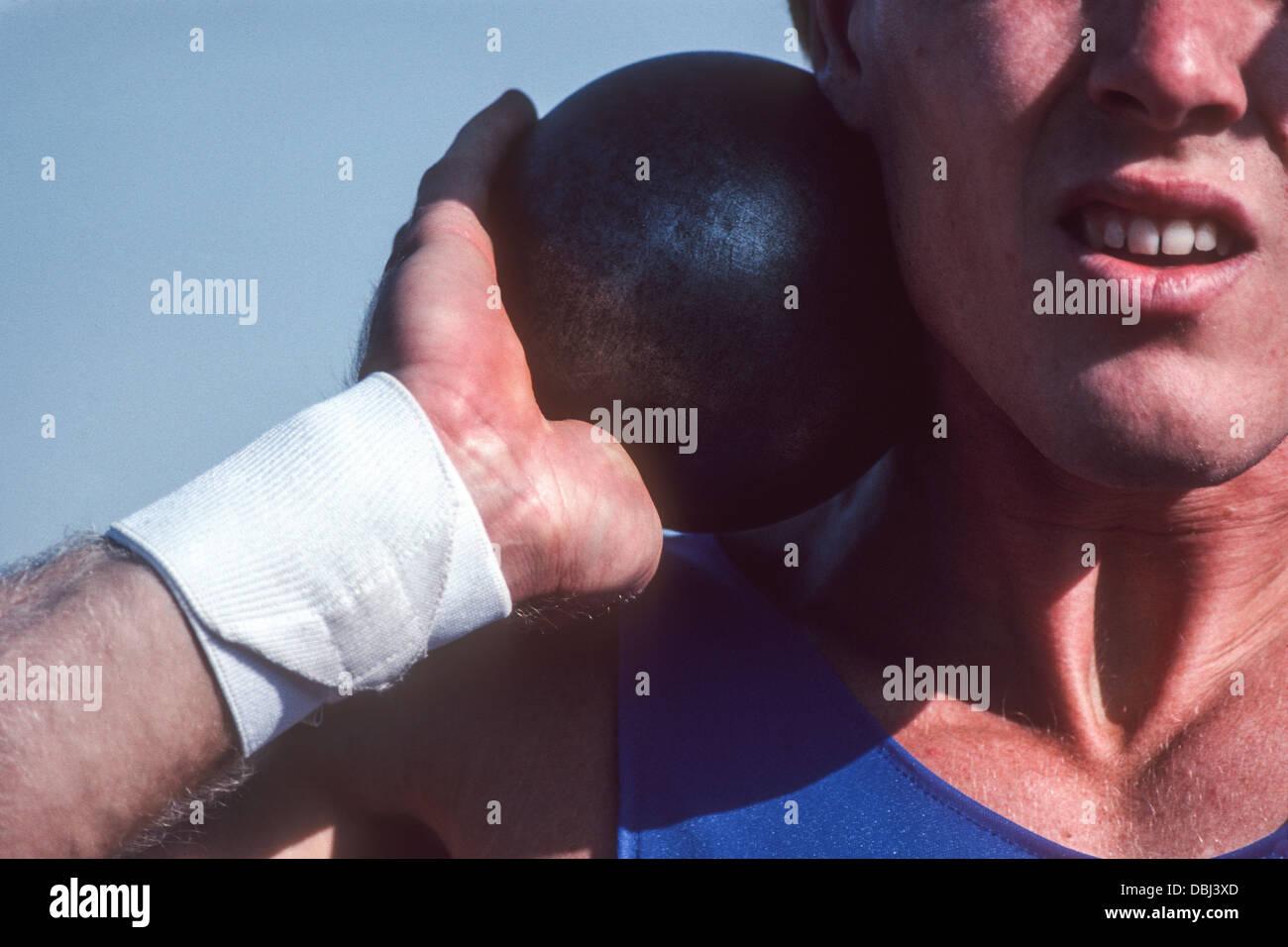 Detail of male shot putter in action Stock Photo - Alamy