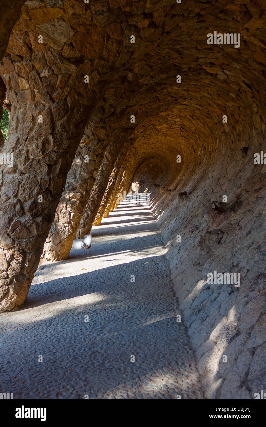 Arcade of stone columns in Park Guell, designed by Gaudi Stock Photo ...