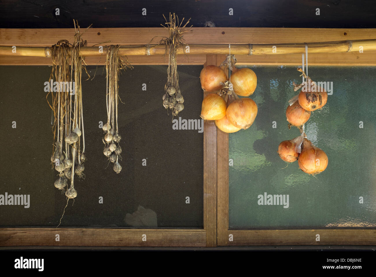 Onions drying hanging hi-res stock photography and images - Alamy