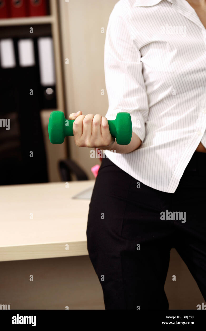 Office worker weight lifting Stock Photo - Alamy