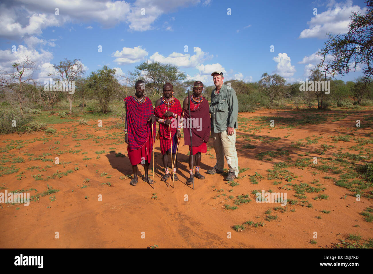 Masai warriors pose with photographer. Ol Kinyei conservancy. Kenya ...