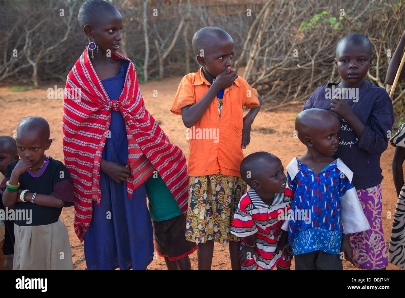 Masai Children in Western clothing outside boma. Ol Kinyei Conservancy ...