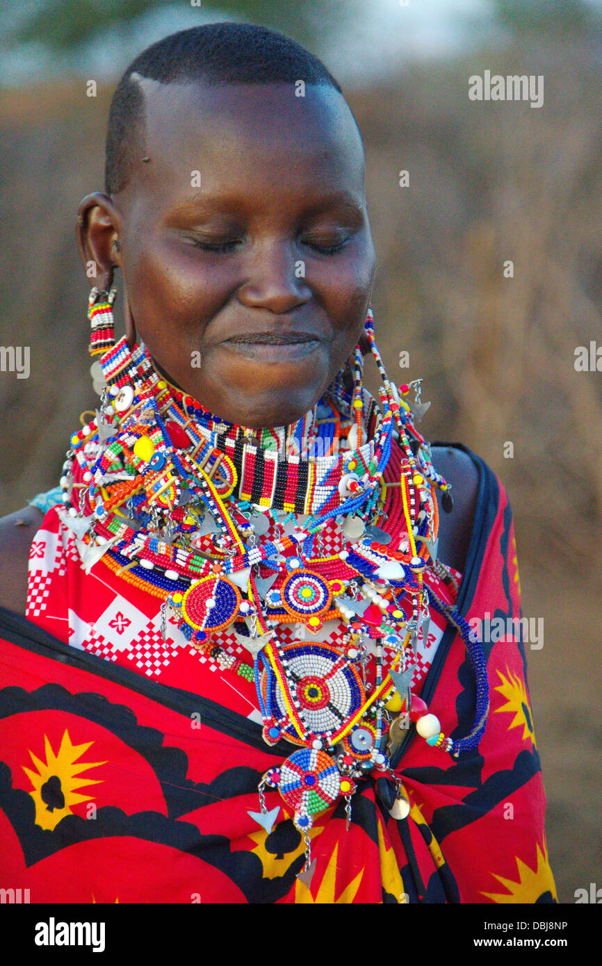 Portrait of Masai Woman in traditional clothing and jewelry. Ol Kinyei ...