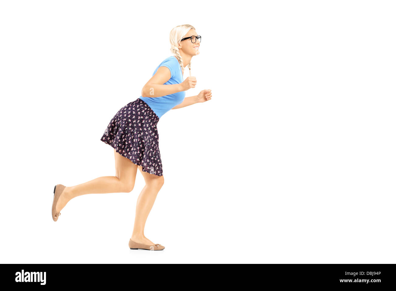 Full length portrait of a smiling woman running isolated on white ...