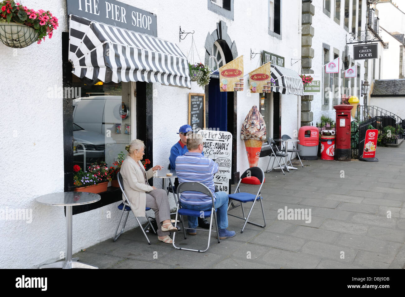 Woman sitting in café hi-res stock photography and images - Alamy