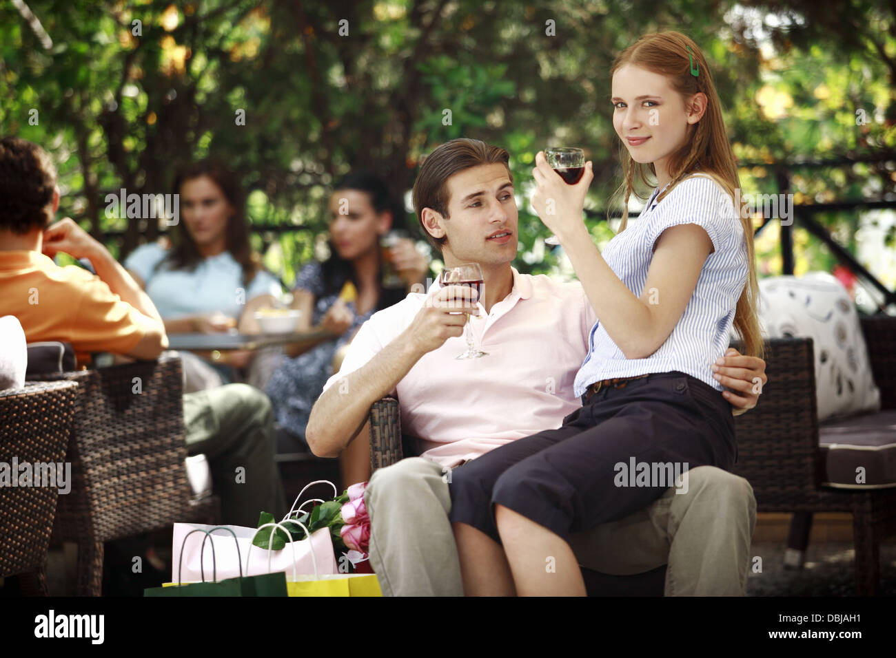 Woman on man's lap hi-res stock photography and images - Alamy
