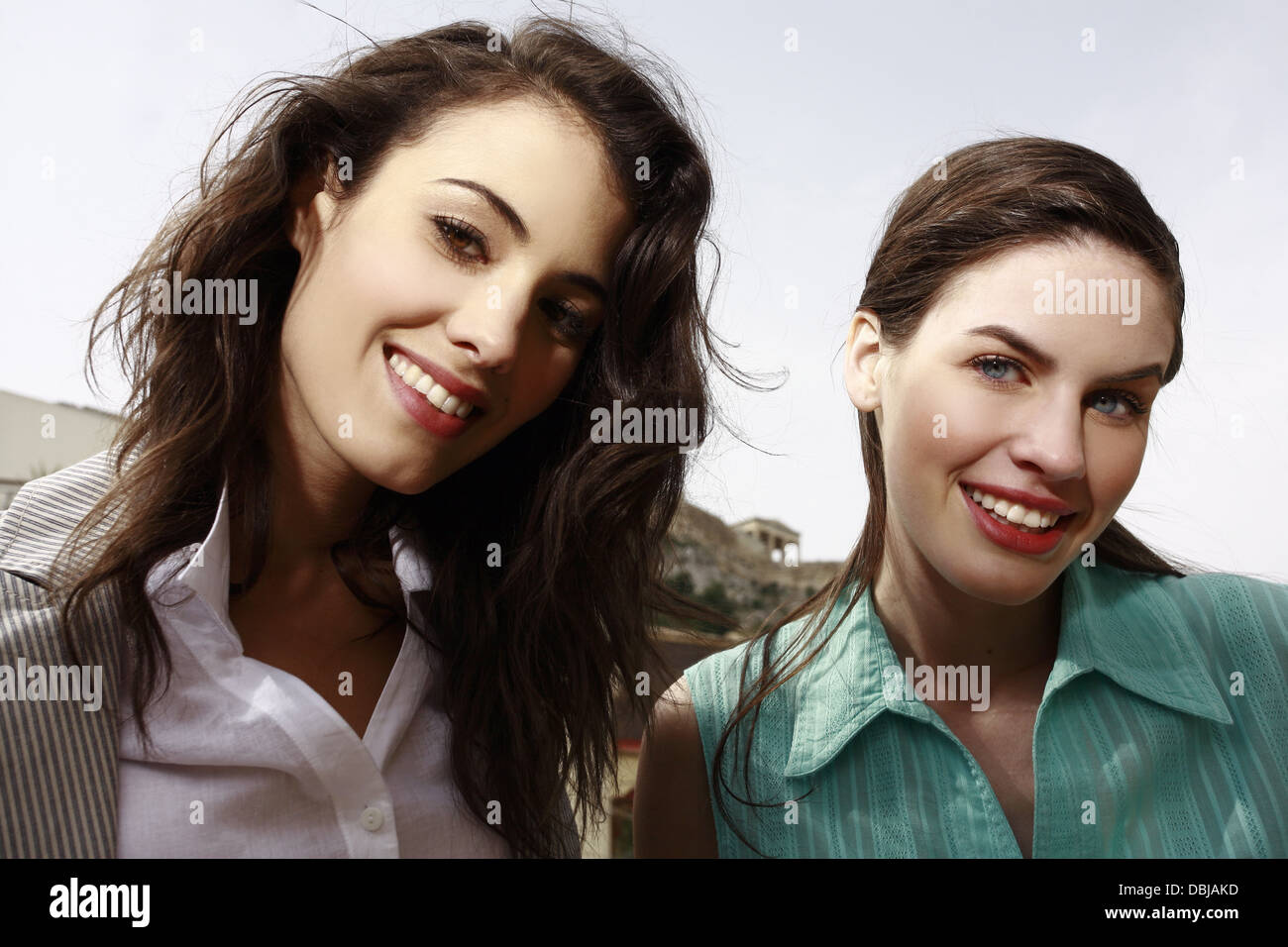 Two women smiling Stock Photo - Alamy