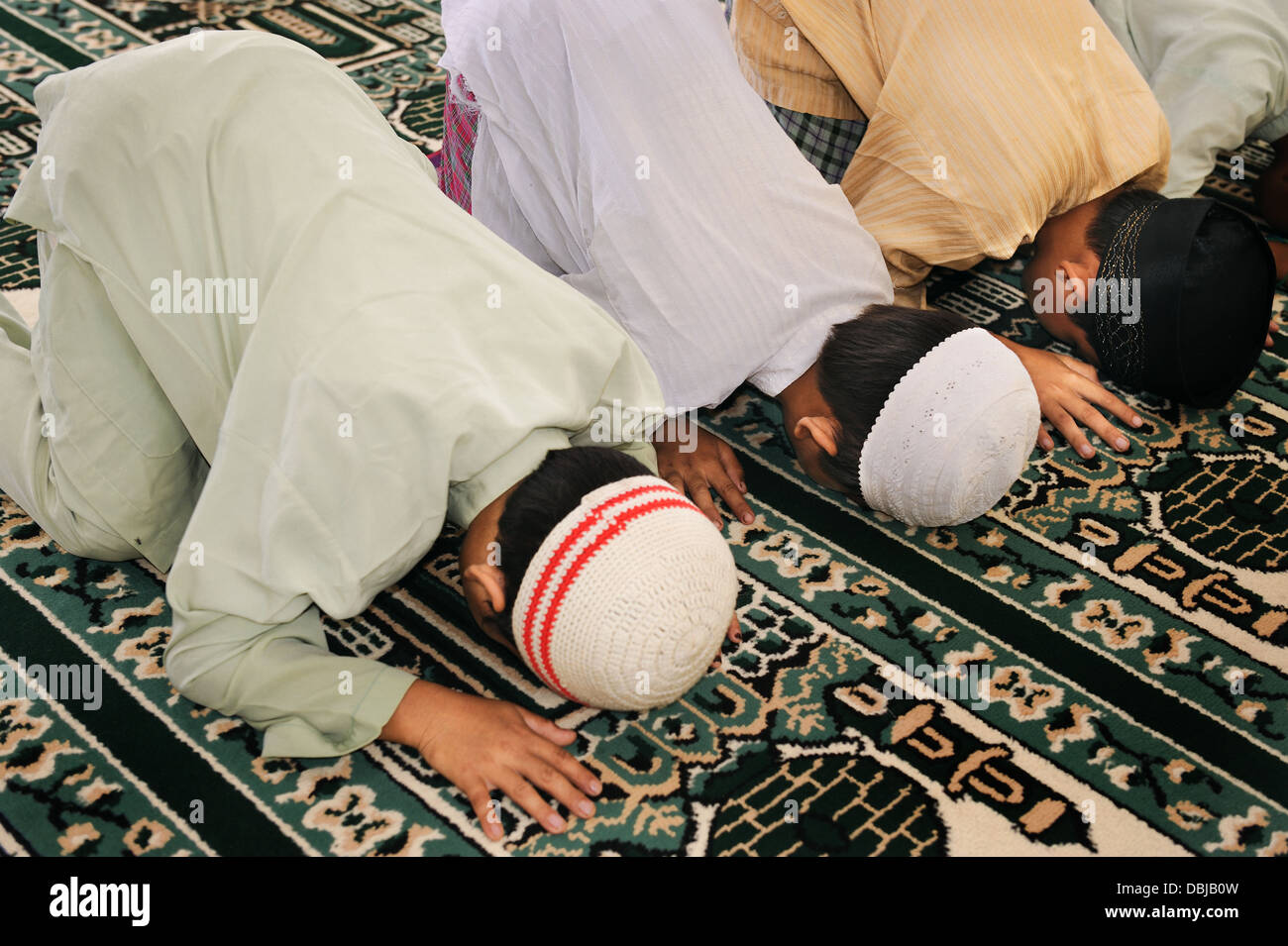 Muslim Kids Praying Stock Photo - Alamy Muslim Kids Praying Stock Photo - Alamy