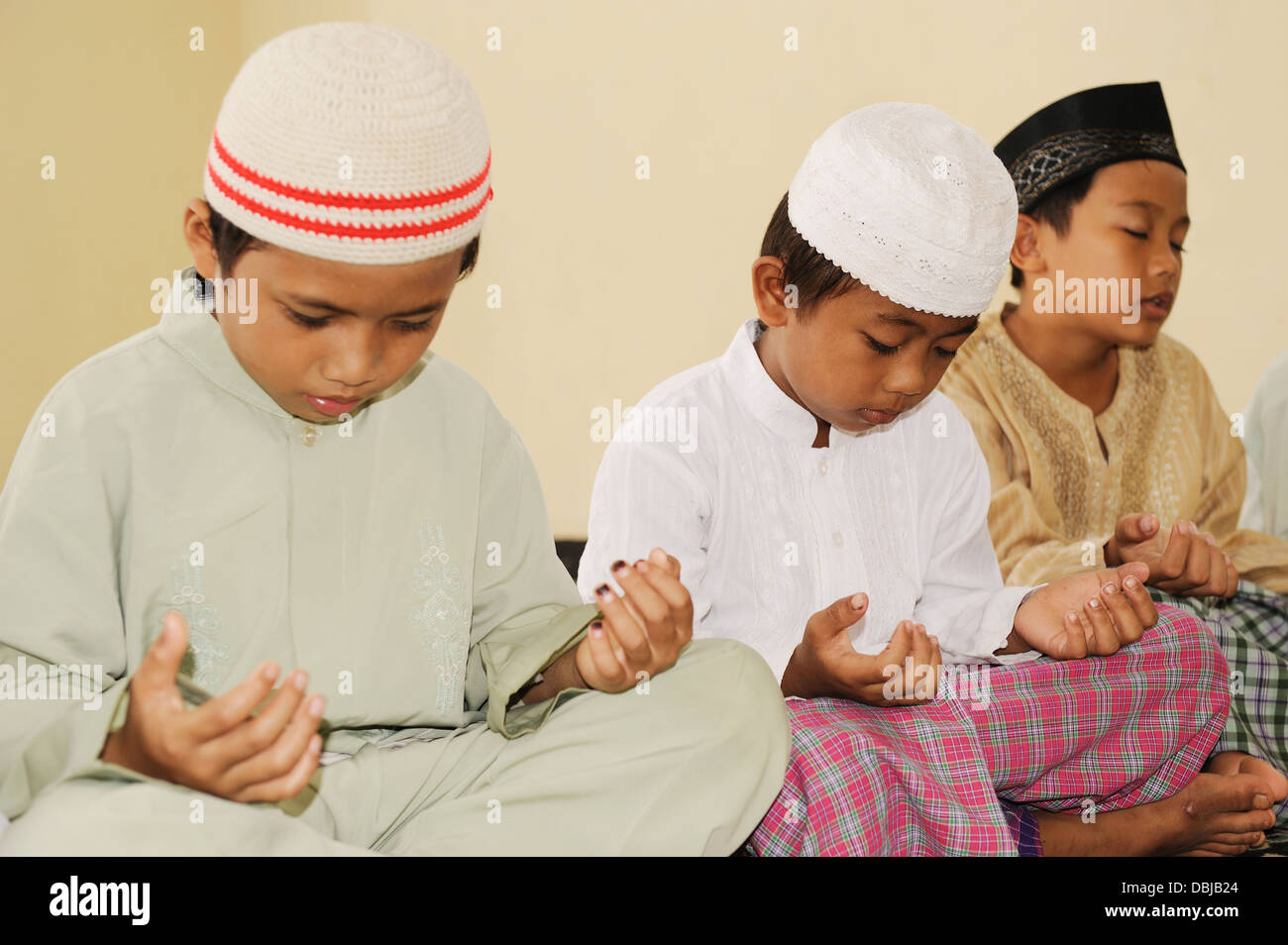 Muslim Kids Praying Stock Photo - Alamy Muslim Kids Praying Stock Photo - Alamy