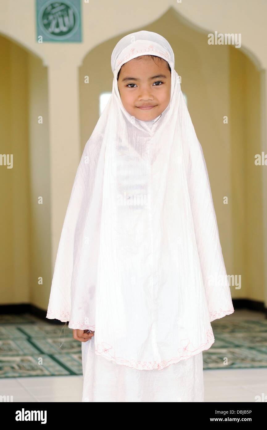 Female muslim child hijab holding hi-res stock photography and images ...