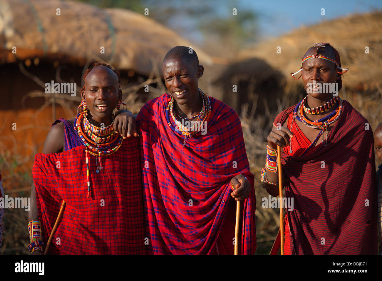 Masai Villagers in traditional clothing outside boma. Selenkay ...
