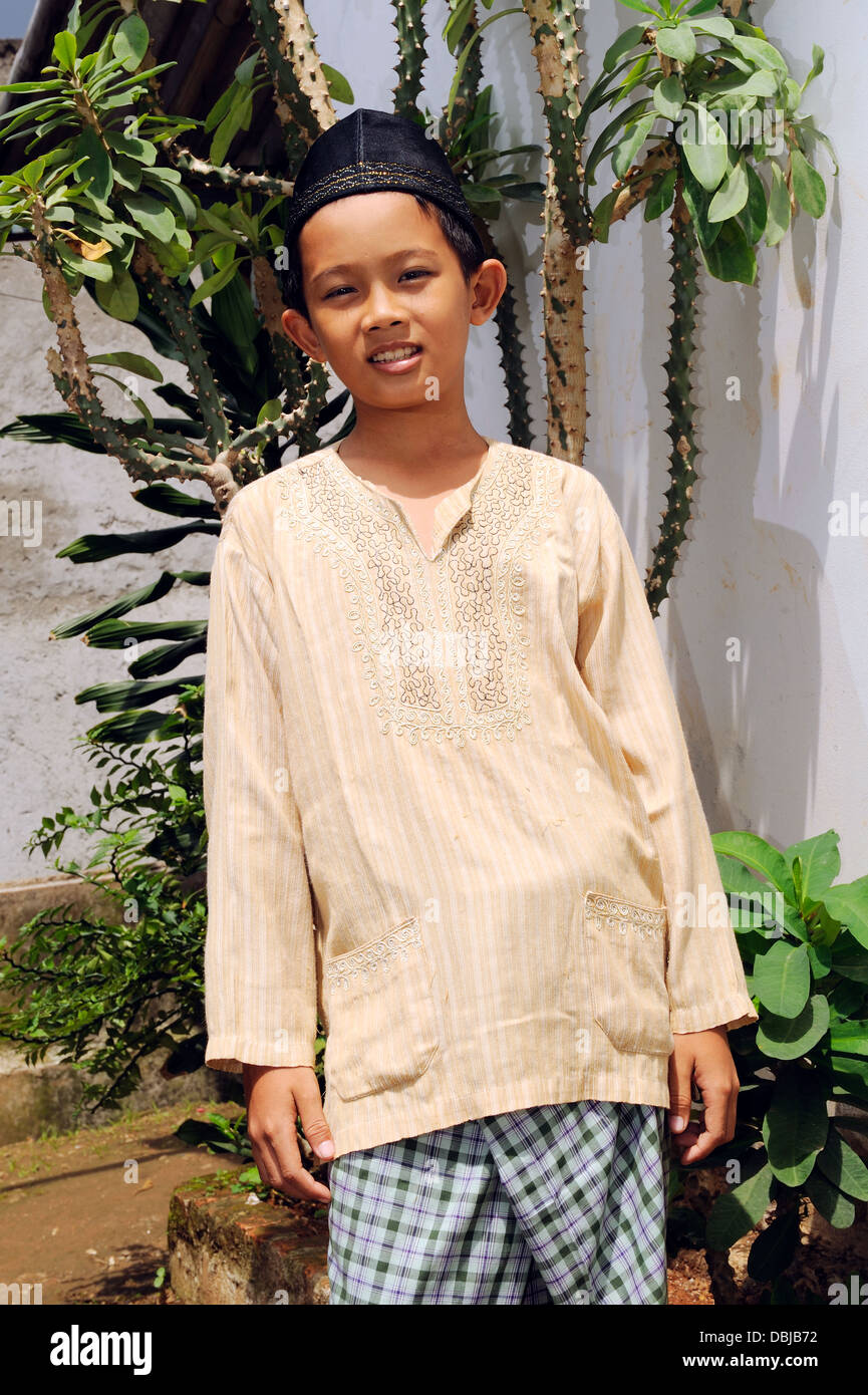 Portrait of happy Muslim Indonesian boy Stock Photo - Alamy