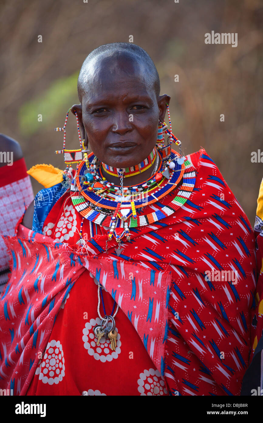 Portrait of old Masai Woman in traditional clothing and jewelry ...