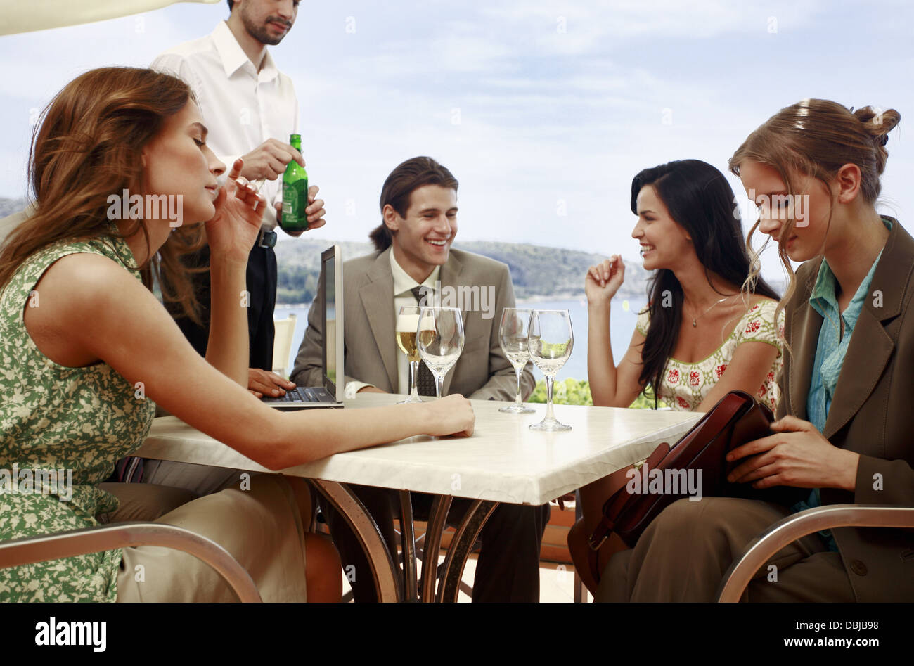 Office workers having drinks in outdoor cafe Stock Photo - Alamy