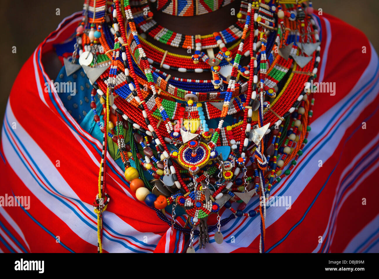 Close up of traditional Masai clothing and jewelry. Selenkay ...