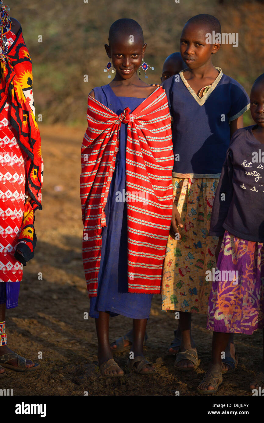 Portait of young Masai women som in traditional Masai clothing and ...