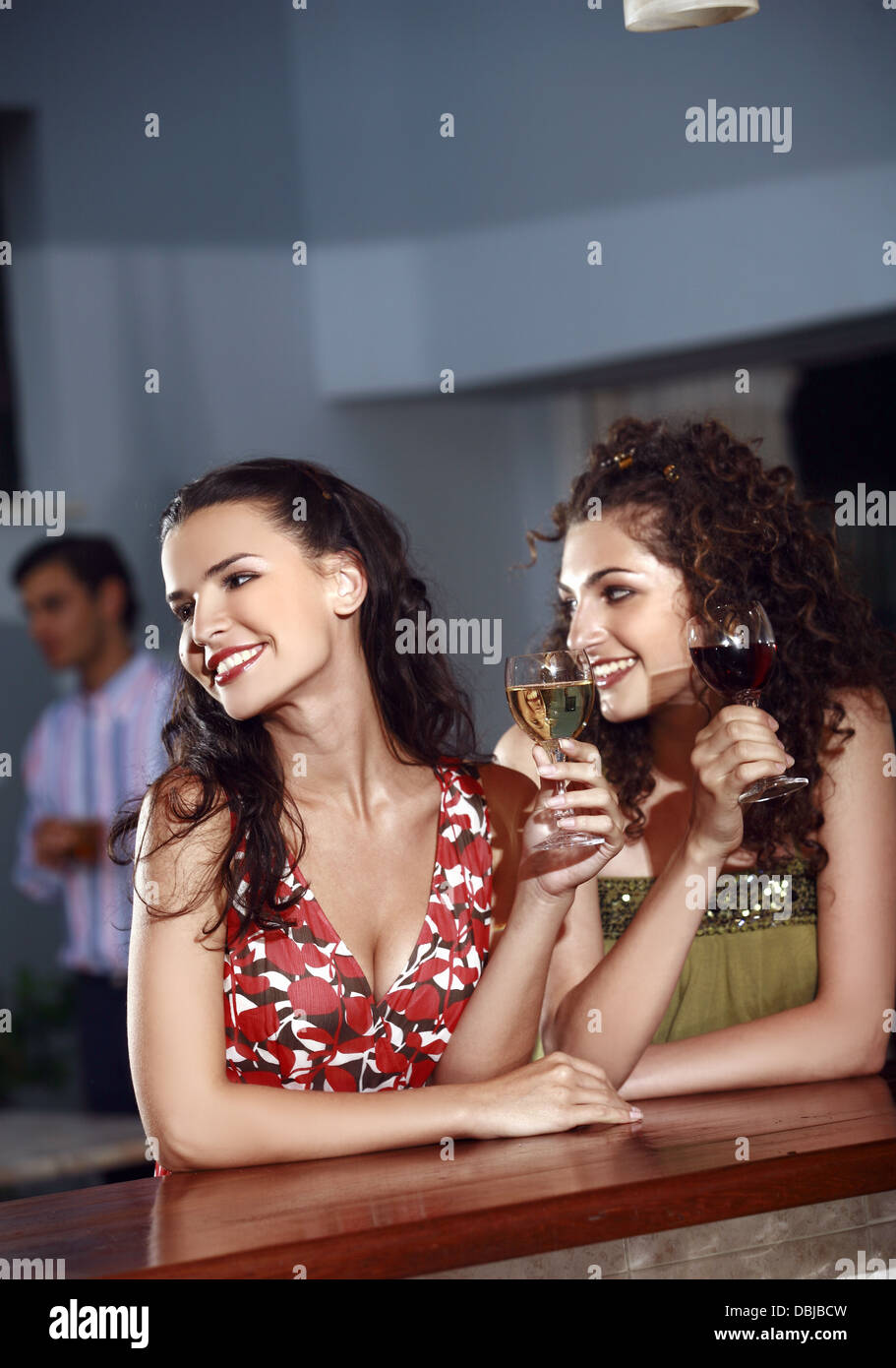 Two women in a bar Stock Photo - Alamy
