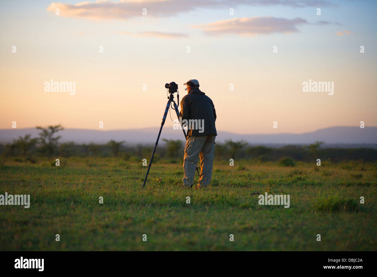 Nature Photographer Wayne Hughes working in the Ol Kinyei Conservancy ...