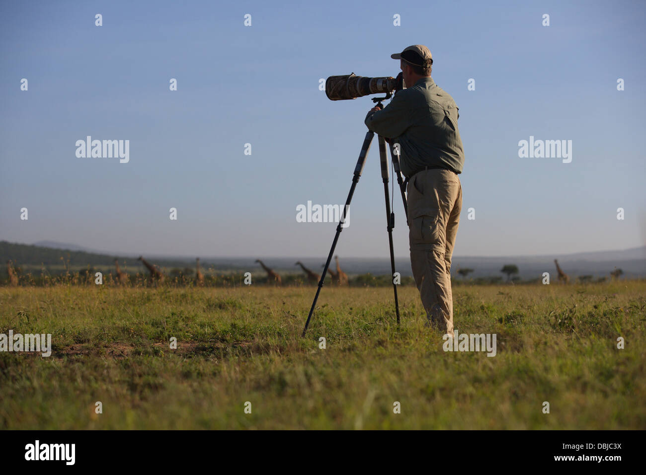 Nature Photographer Wayne Hughes working in the Ol Kinyei Conservancy ...