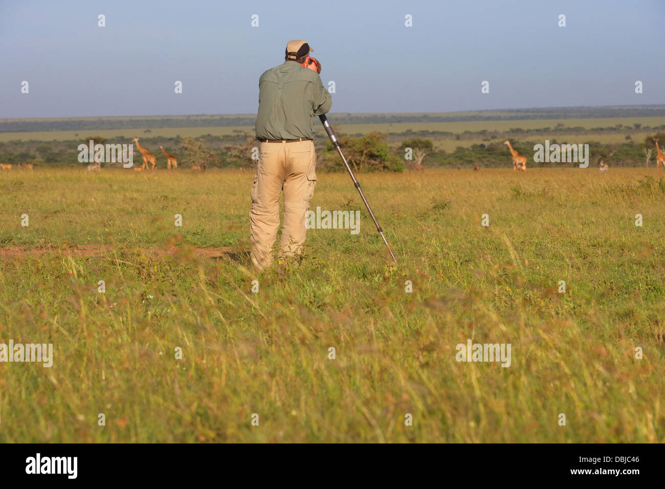 Nature Photographer Wayne Hughes working in the Ol Kinyei Conservancy ...