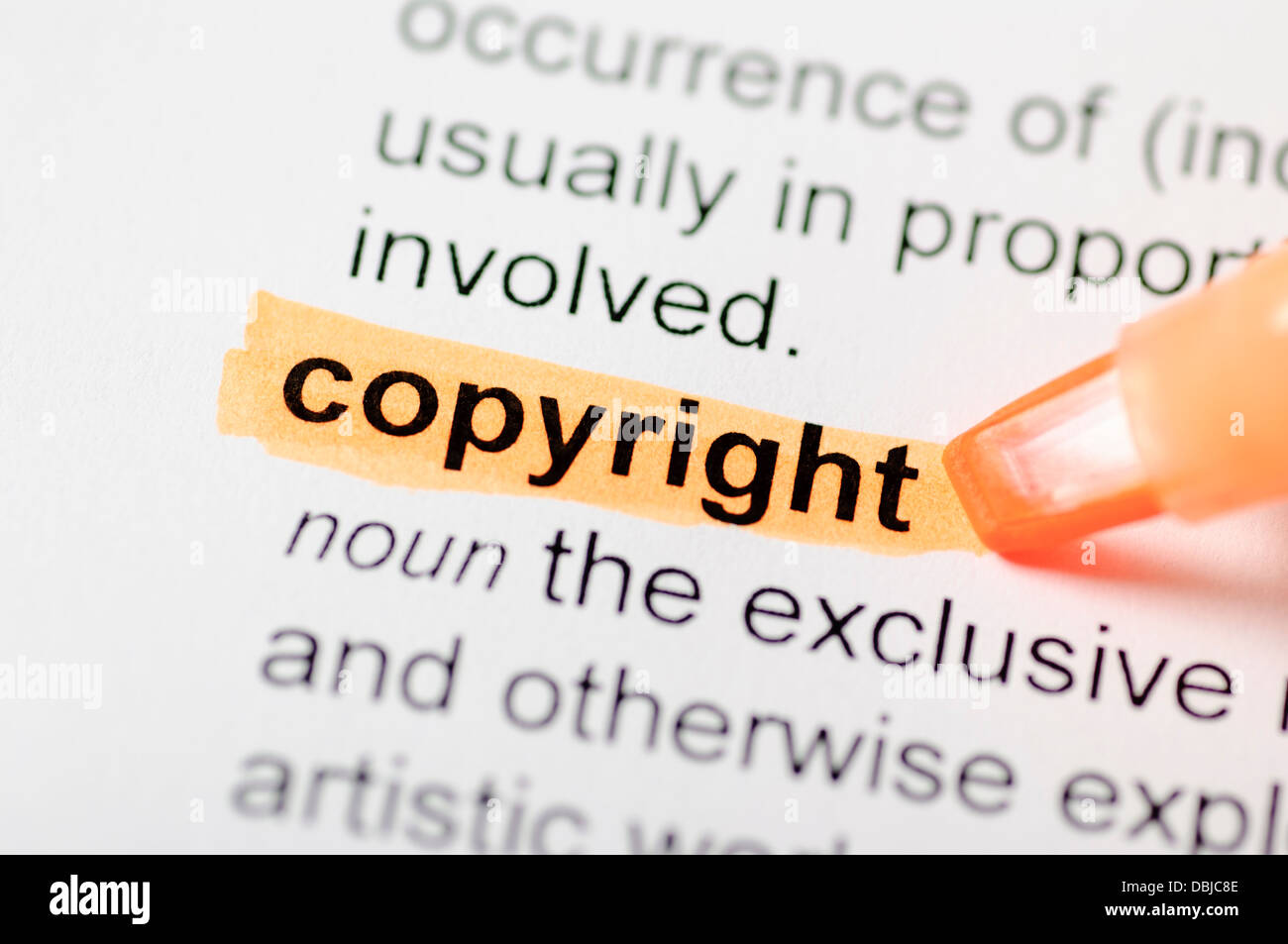 Orange marker on copyright word Stock Photo - Alamy