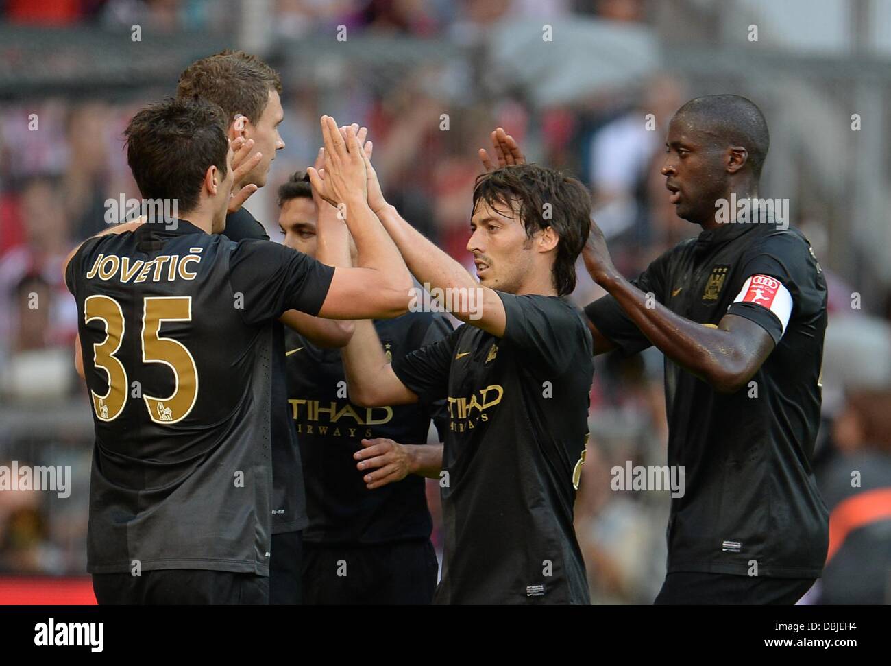 Munich, Germany. 31st July, 2013. Manchester's Stevan Jovetic (from L ...