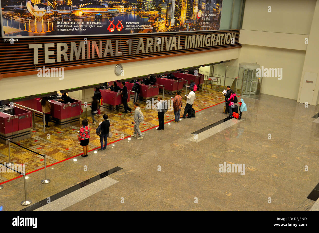 Singapore Changi airport arrival immigration counters Stock Photo - Alamy