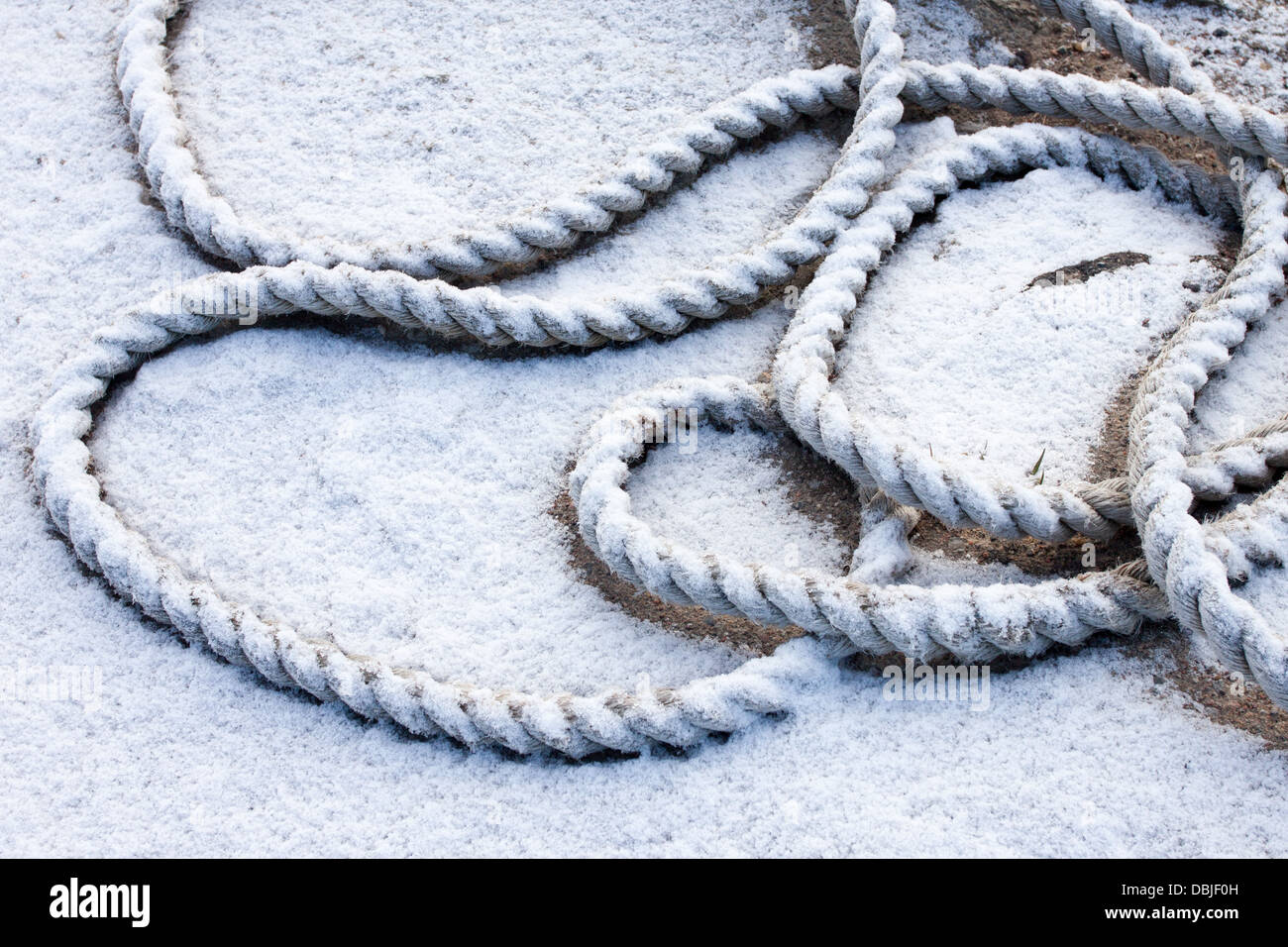 frozen ship cable under snow Stock Photo - Alamy