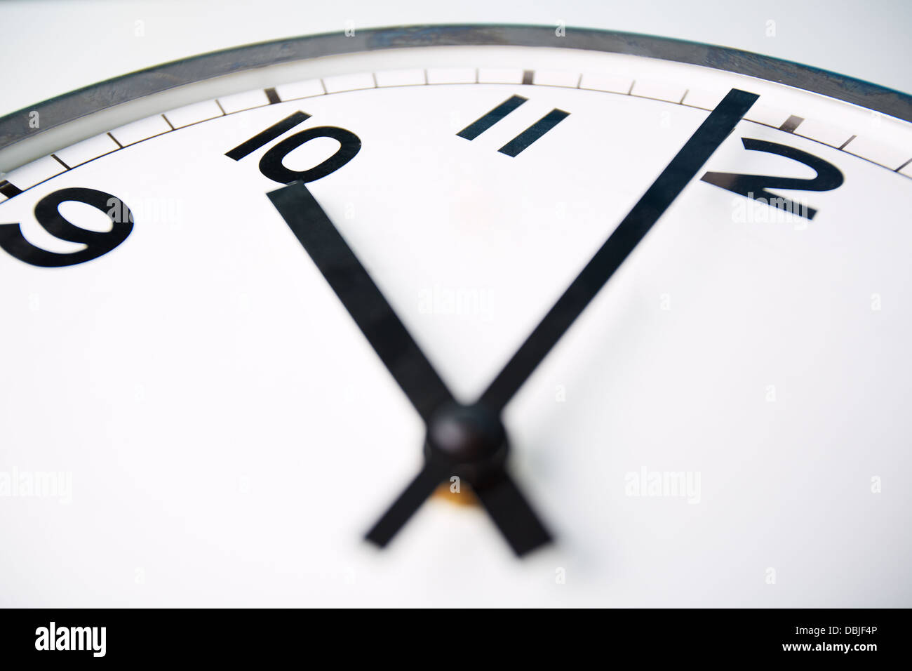 Wall clock showing time eleven hi-res stock photography and images - Alamy
