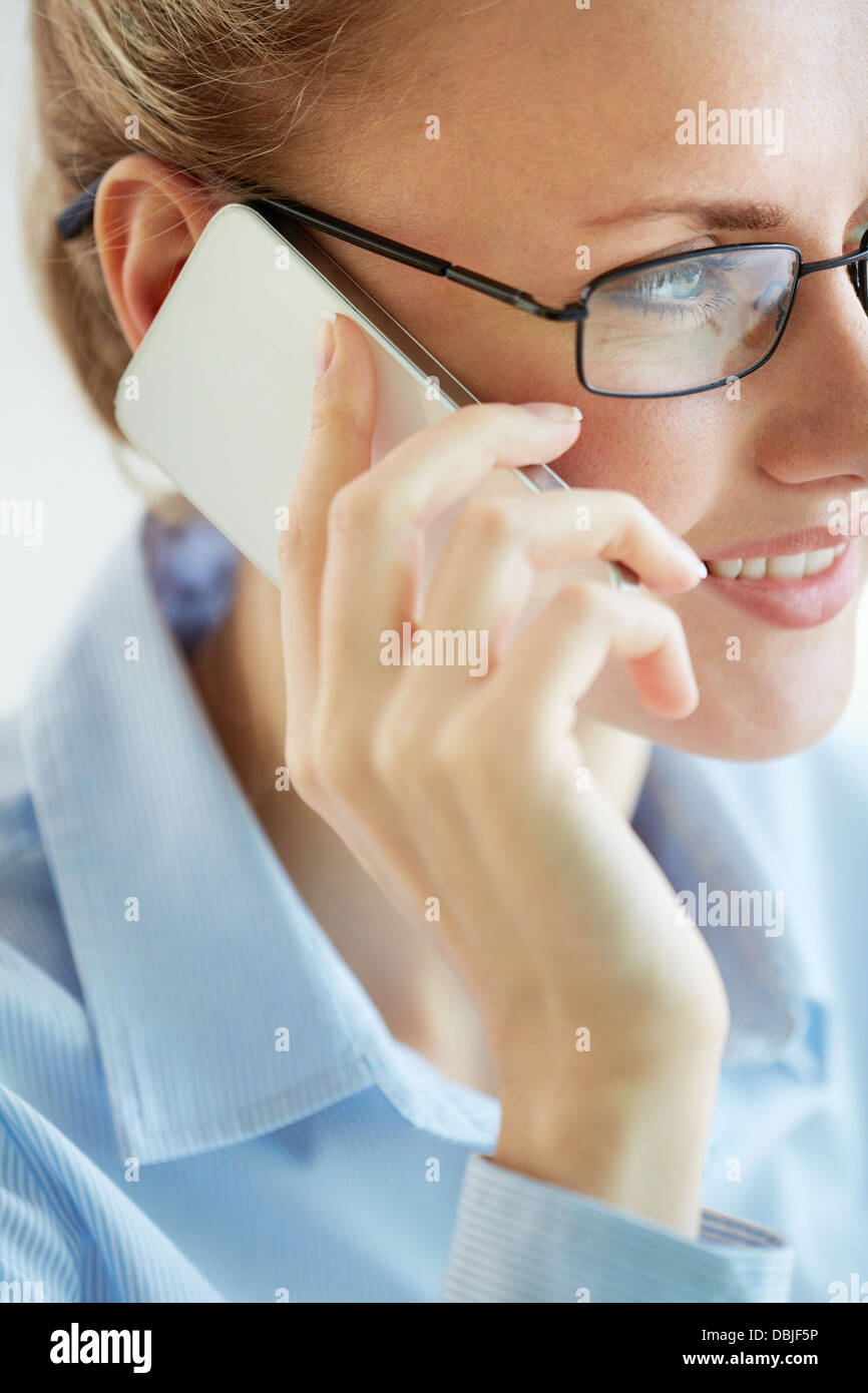 Vertical image of a lovely business lady making an important call Stock ...
