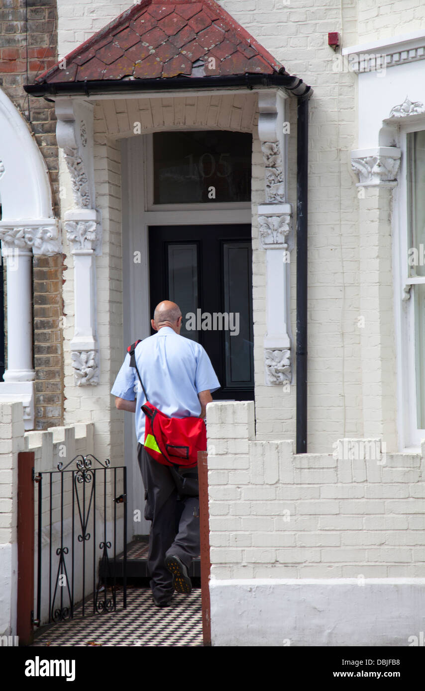 English postman uniform hi-res stock photography and images - Alamy