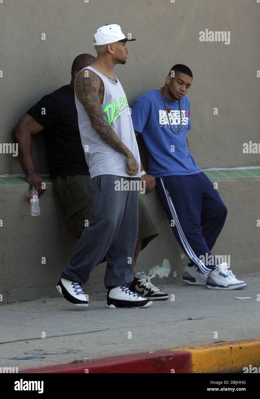 Chris Brown chats to friends outside a recording studio in Hollywood ...